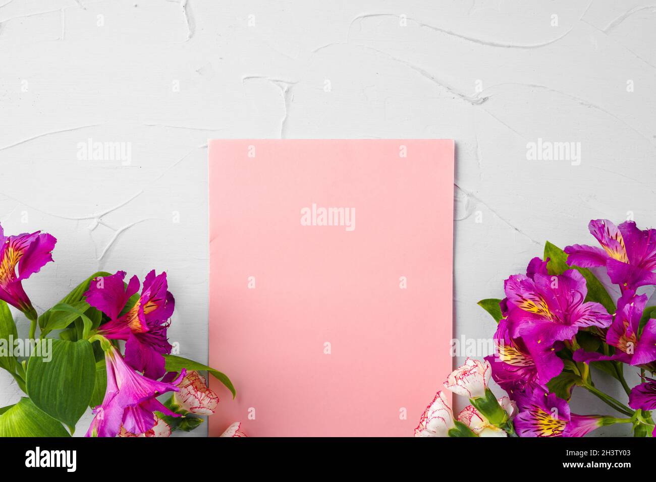 Top view of a pink paper letter and flowers with copy space Stock Photo ...