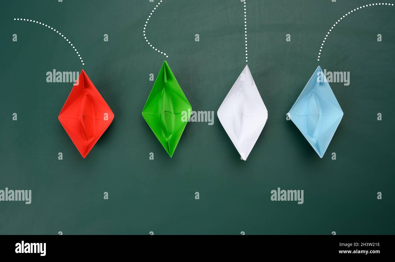 Leadership concept paper boats hi-res stock photography and images - Alamy