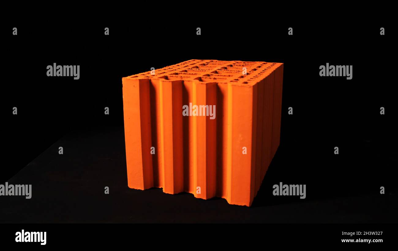 Abstract animation of 3d orange brick surface on the black background ...