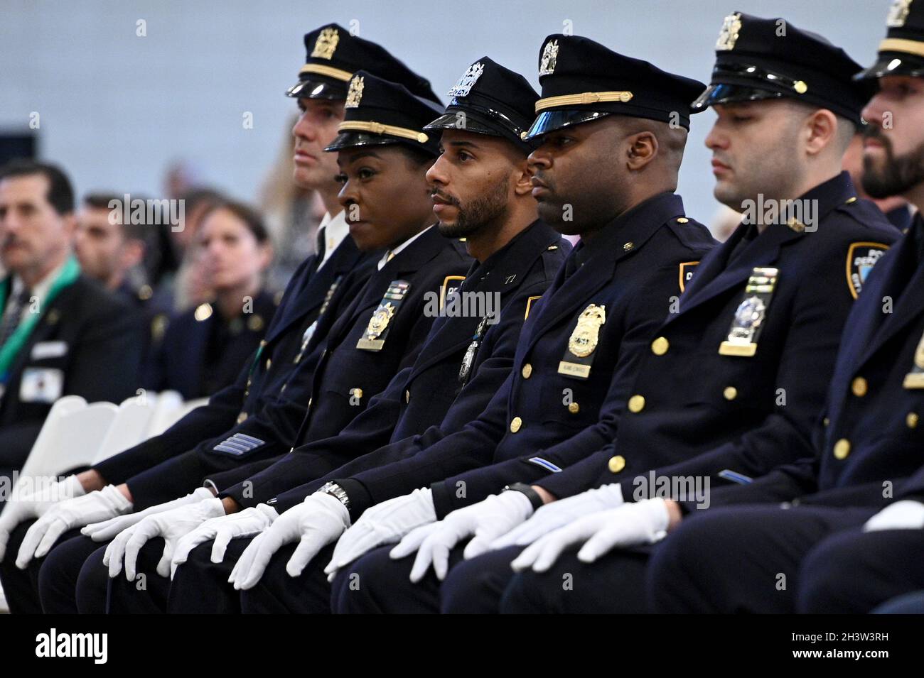 New York, USA. 29th Oct, 2021. A group of honored NYPD officers sit ...
