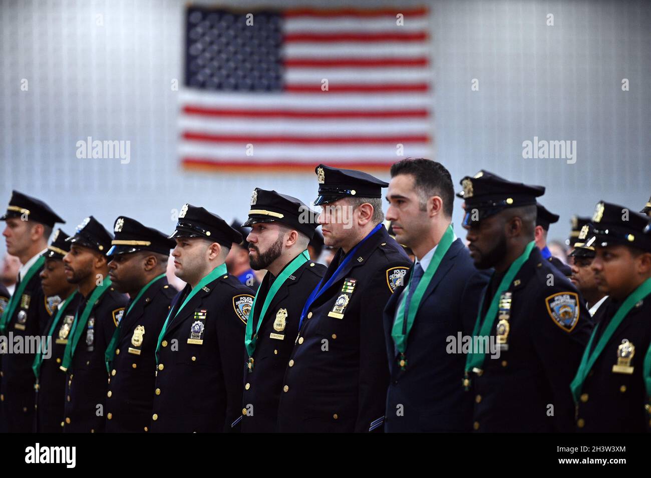 New York, USA. 29th Oct, 2021. A group of honored NYPD officers sit ...