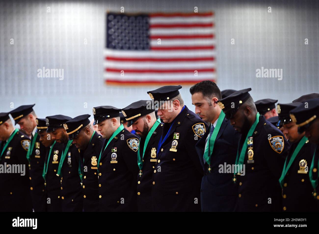 New York, USA. 29th Oct, 2021. A group of honored NYPD officers sit ...