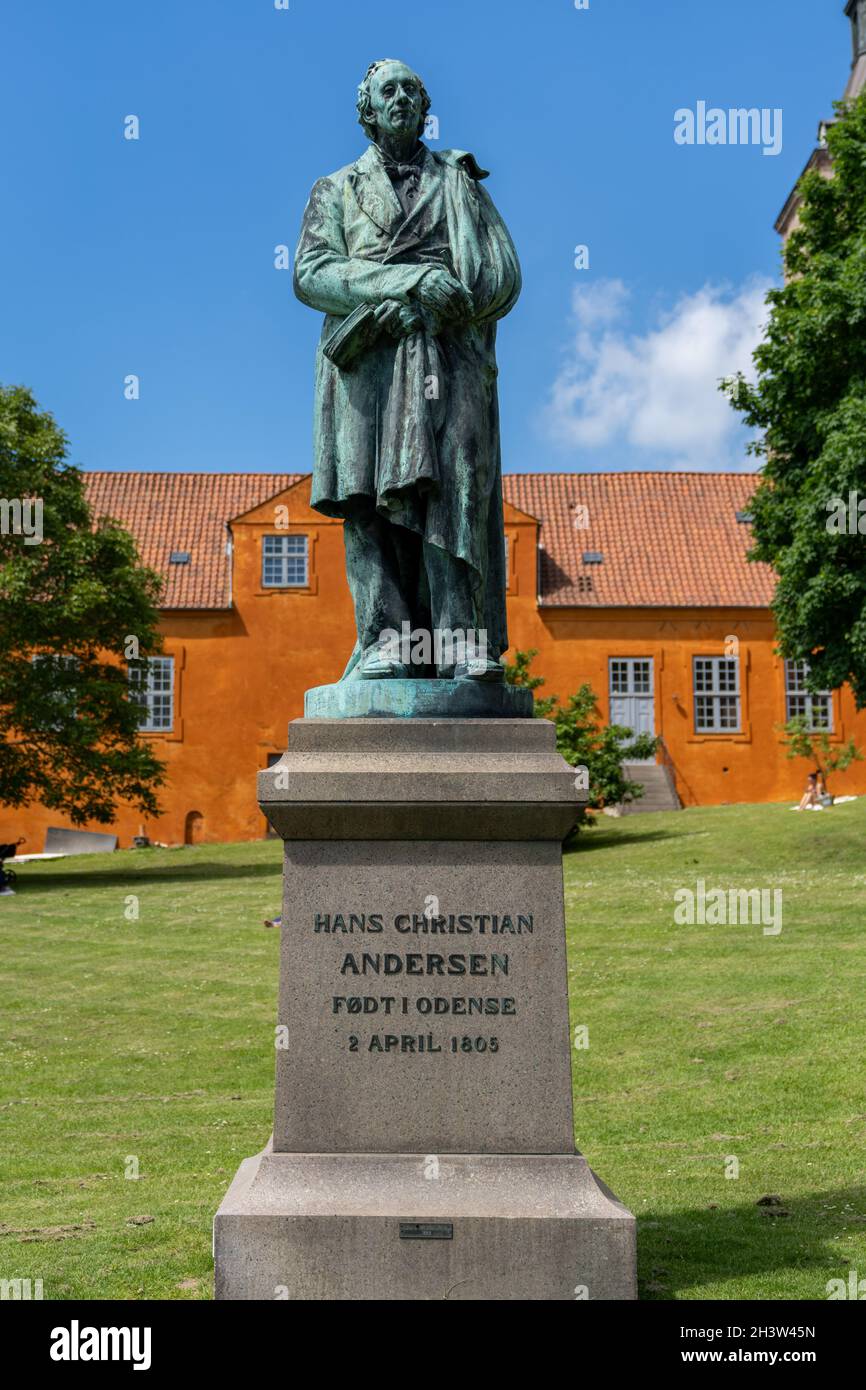 Statue of Hans Christian Andersen in the park of Saint Canute Cathedral ...
