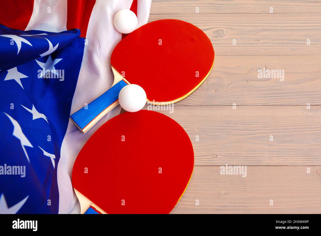 Ping pong equipment on wooden table close up Stock Photo - Alamy