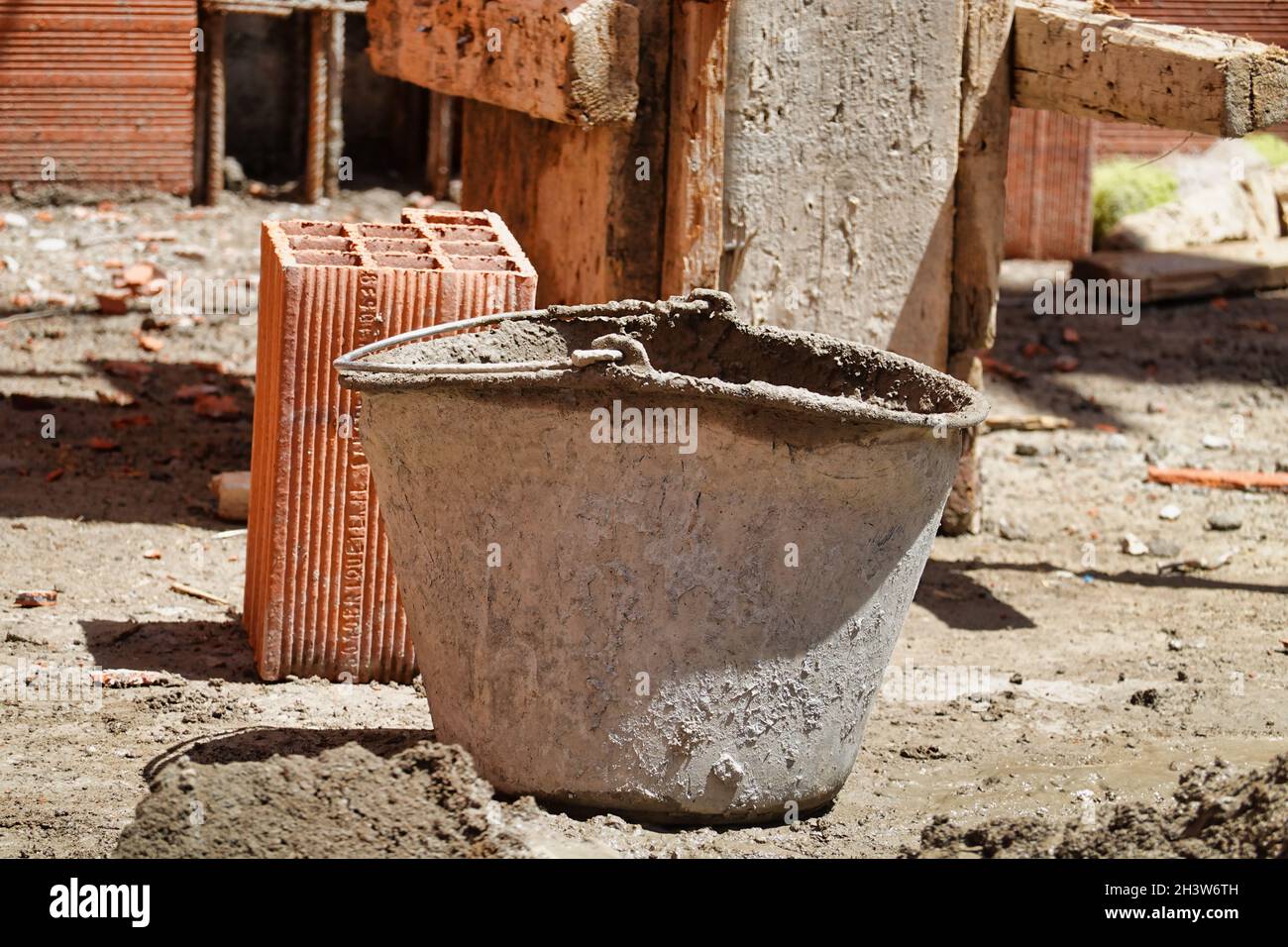 Dirty bucket in an industrial area Stock Photo - Alamy