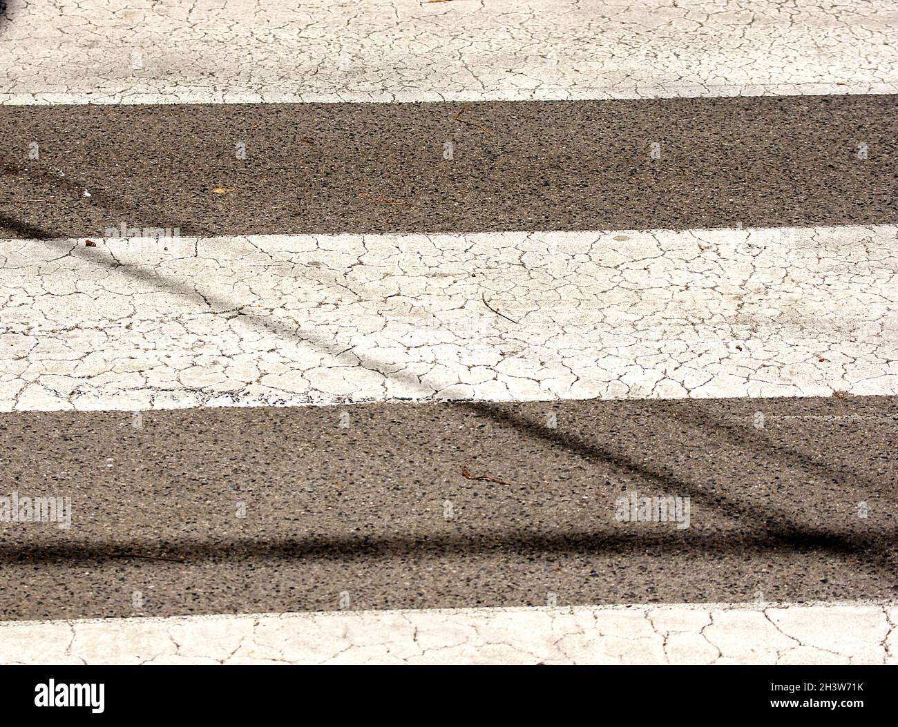 Detail of a zebra crossing for backgrounds Stock Photo - Alamy