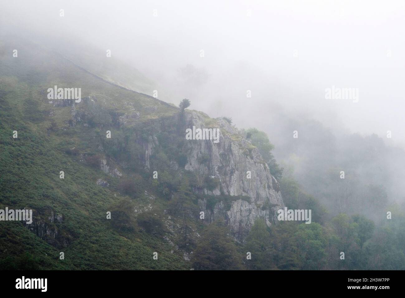 Low lying mist surrounding Llyn Gwynant in the Gwynant Valley ...