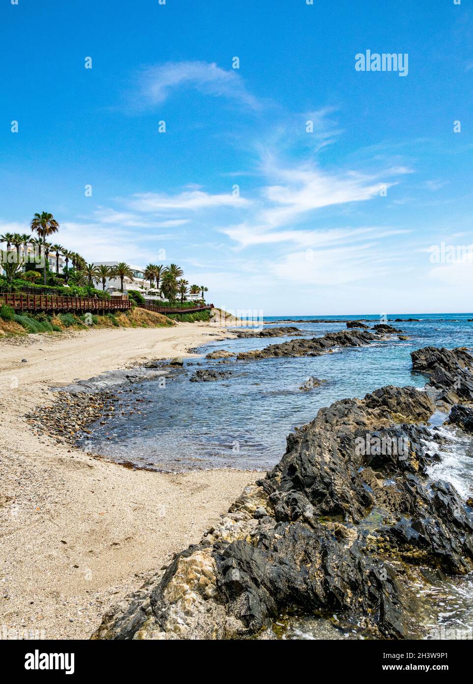 a beachfront view along some of the rocky beaches along the Spanish ...