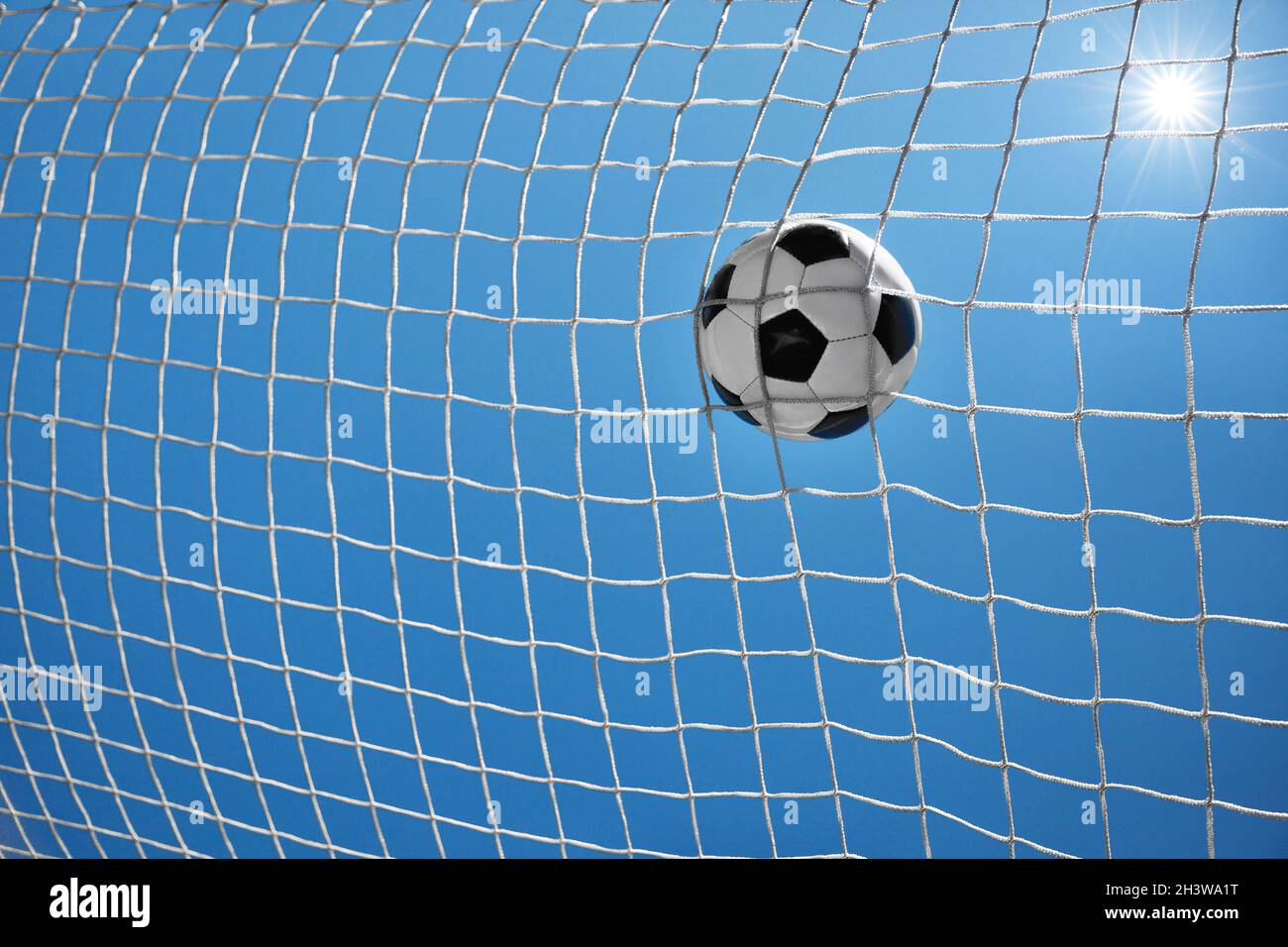 Soccer ball in the net of a goal. Soccer concept Stock Photo - Alamy