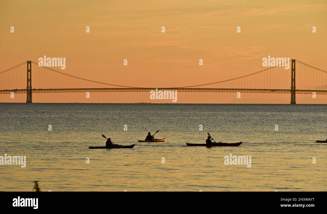 Group of people kayaking during guided tour on Lake Huron during a ...