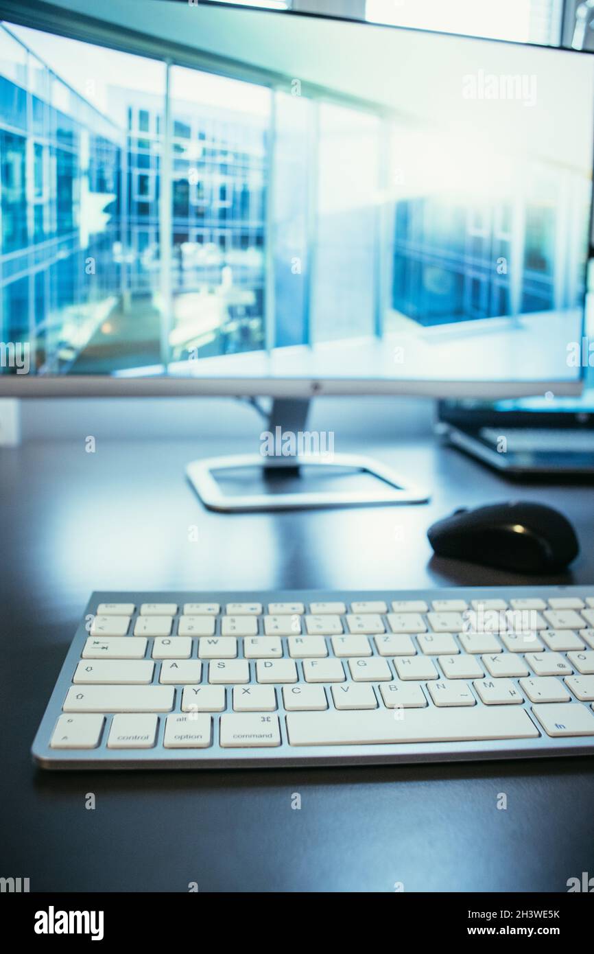 Workplace of a freelancer, screen and keyboard Stock Photo - Alamy