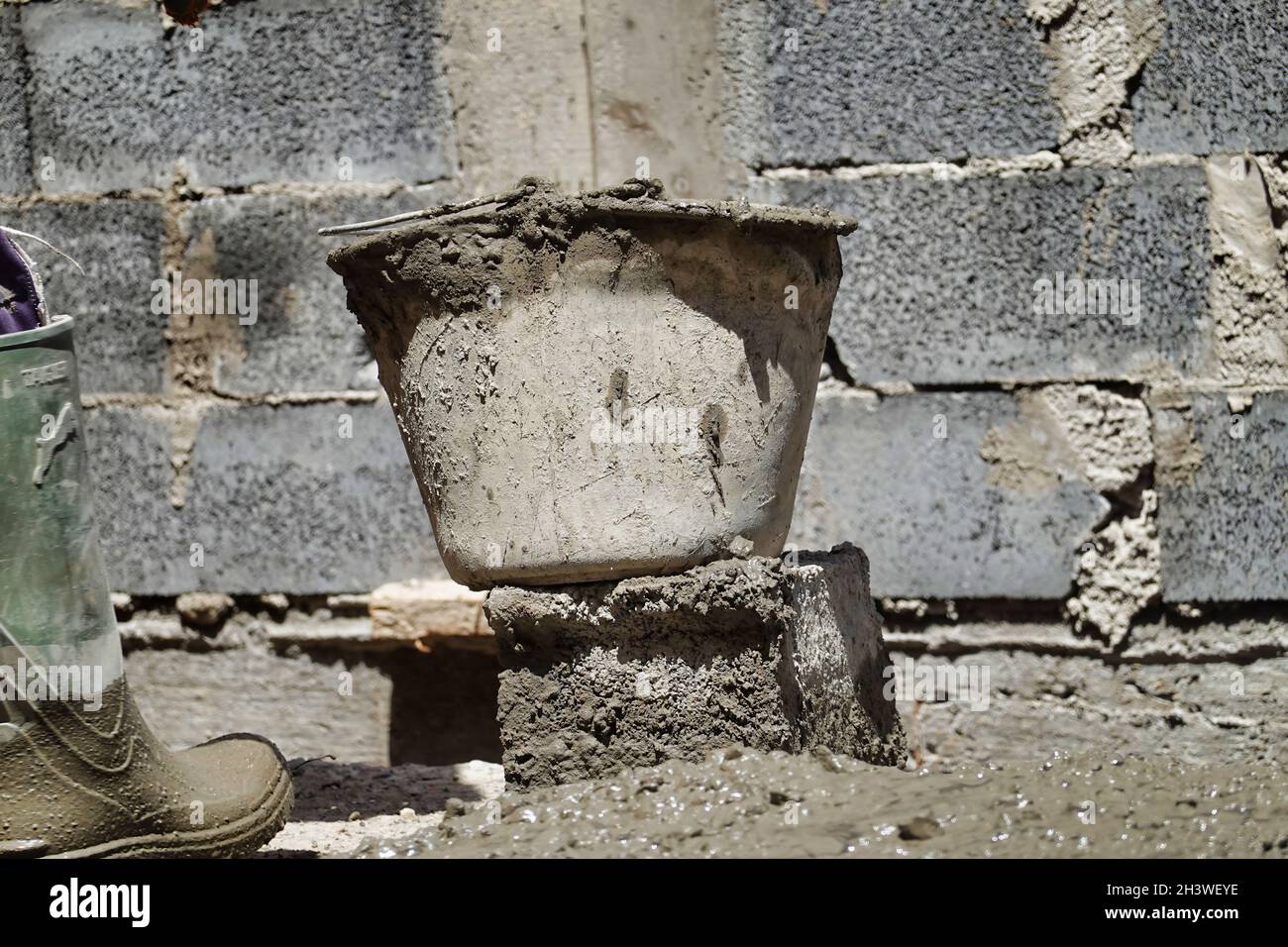 Dirty bucket in an industrial area Stock Photo - Alamy