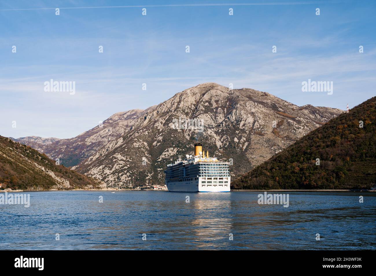 A tall, high-rise huge cruise liner in the Verige Strait, in the Boka ...