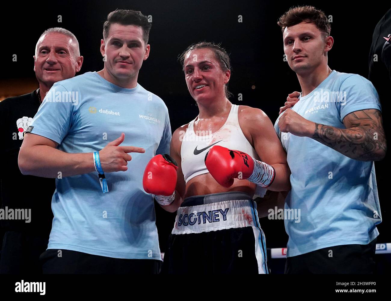 Ellie Scotney (centre) celebrates after winning the International Super ...
