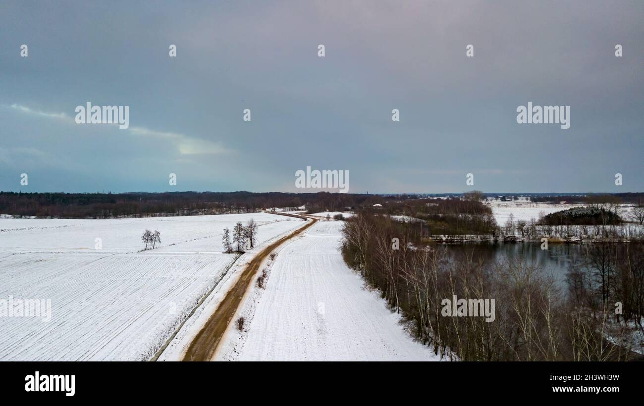 Aerial view with a drone of a spring wavy agricultural countryside ...