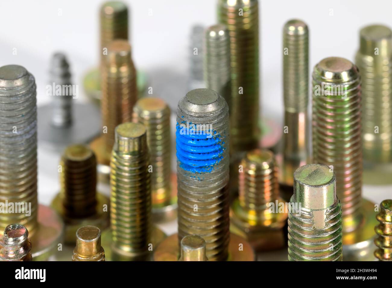 Set of small screws which are industrial items and are spare parts ...