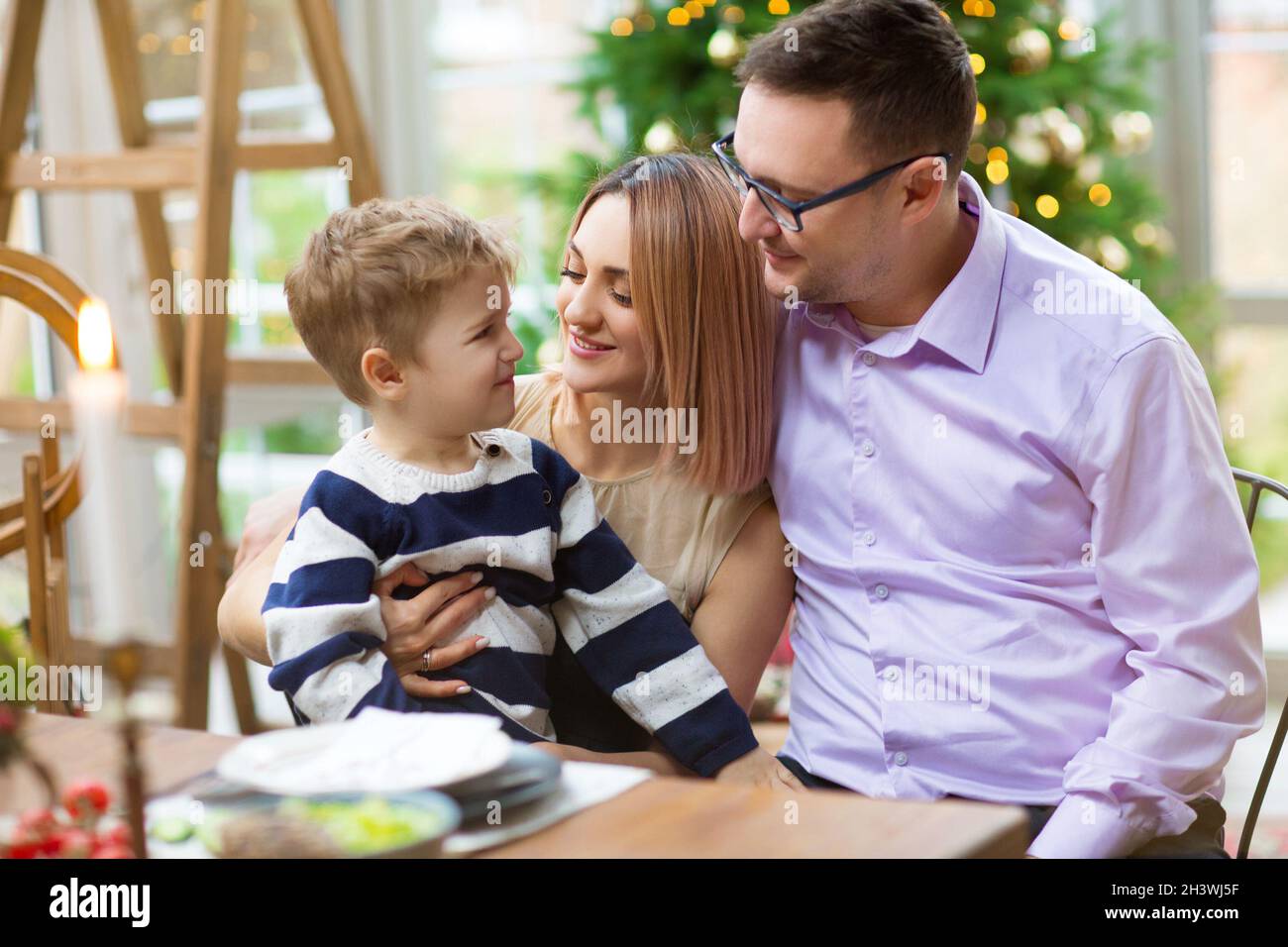 Woman table during family dinner hi-res stock photography and images ...
