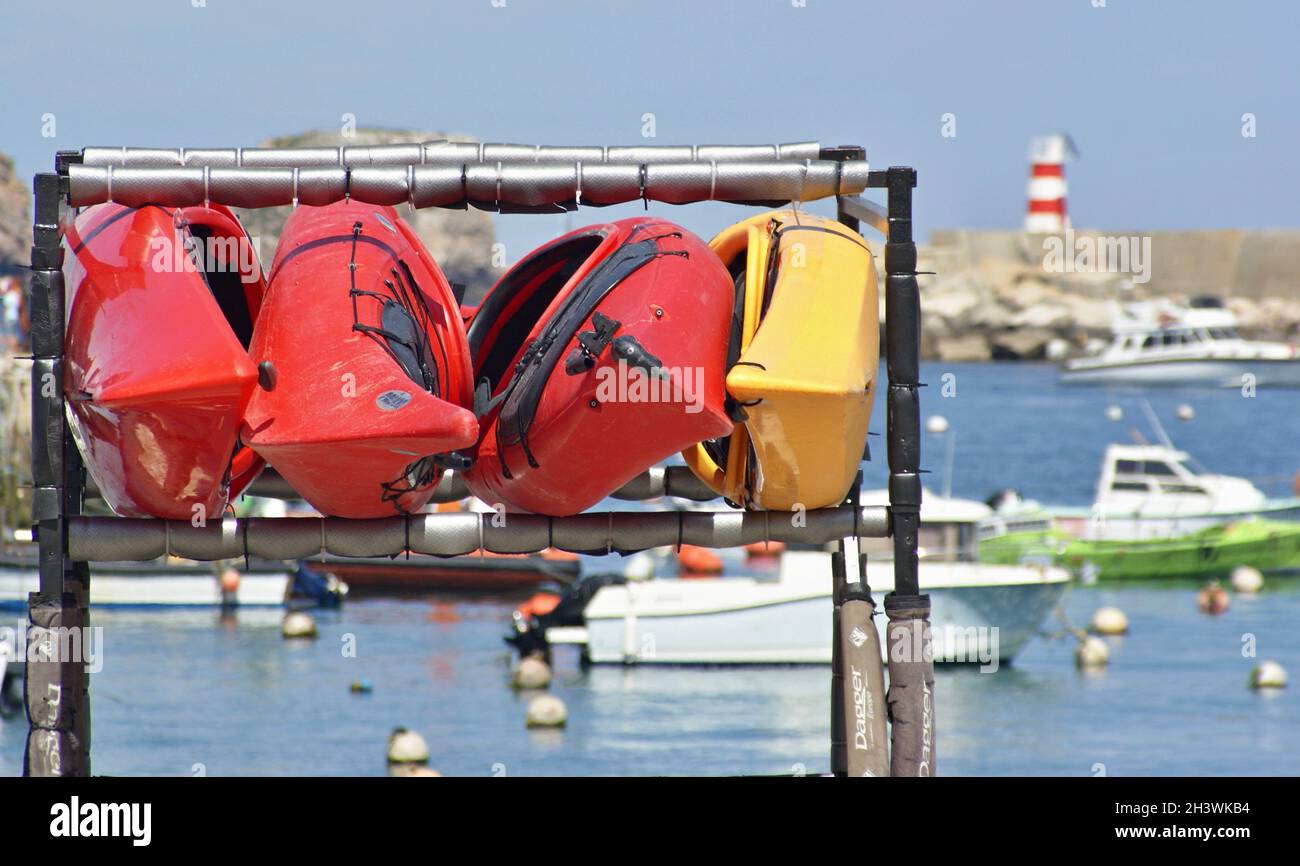 Red and yellow canoes at the port of Lagos, Algarve - Portugal Stock ...