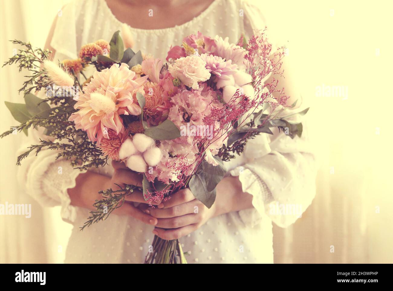 Hiding behind flowers hi-res stock photography and images - Alamy