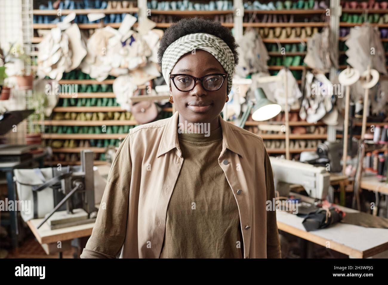 Smiling african shoemaker hi-res stock photography and images - Alamy