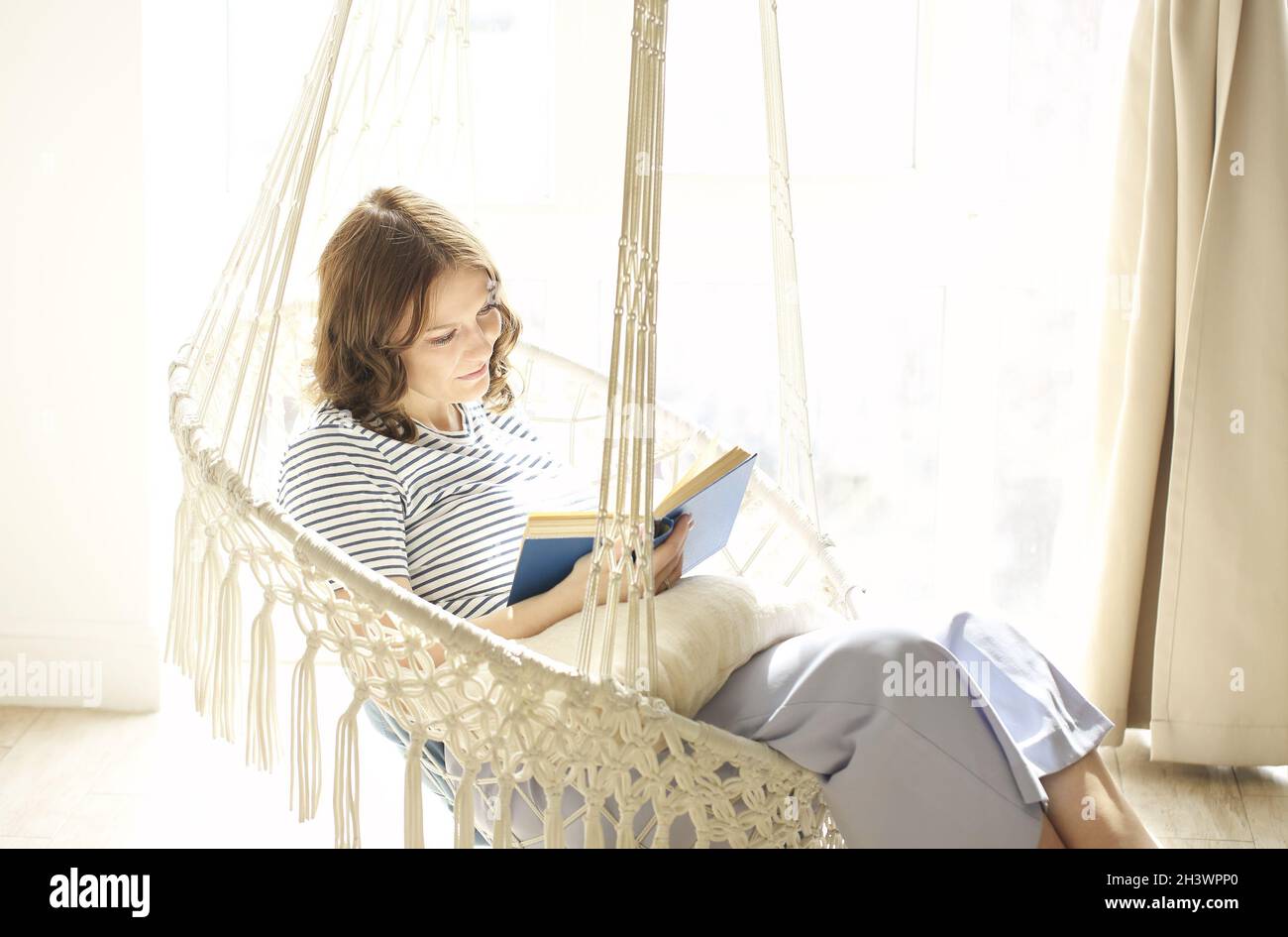 Hanging chair lounge hi-res stock photography and images - Alamy