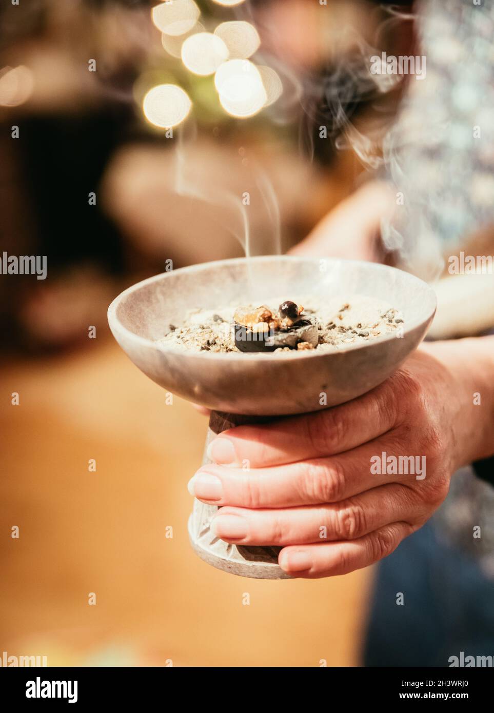 Traditional (esoteric) incense ritual at New Year and Christmas, smoke ...