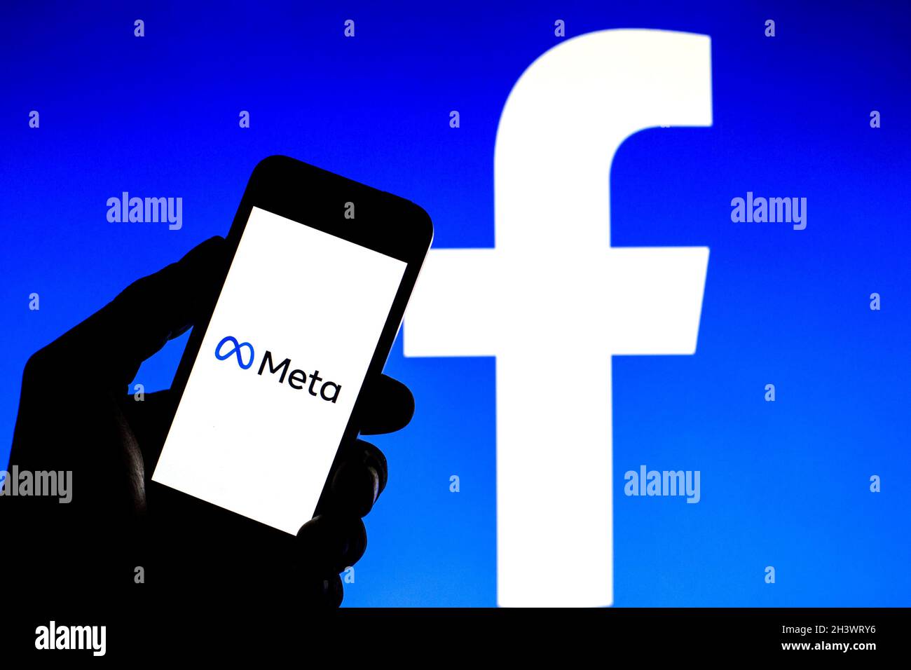 In this photo illustration a Meta logo seen displayed on a smartphone ...