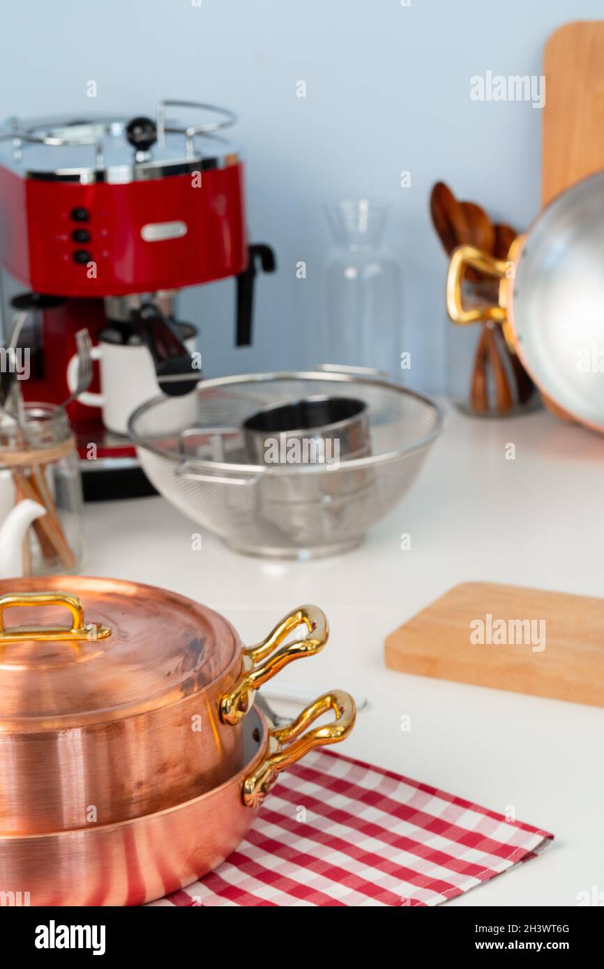 Clean cookware, utensils close up on table in modern kitchen Stock ...