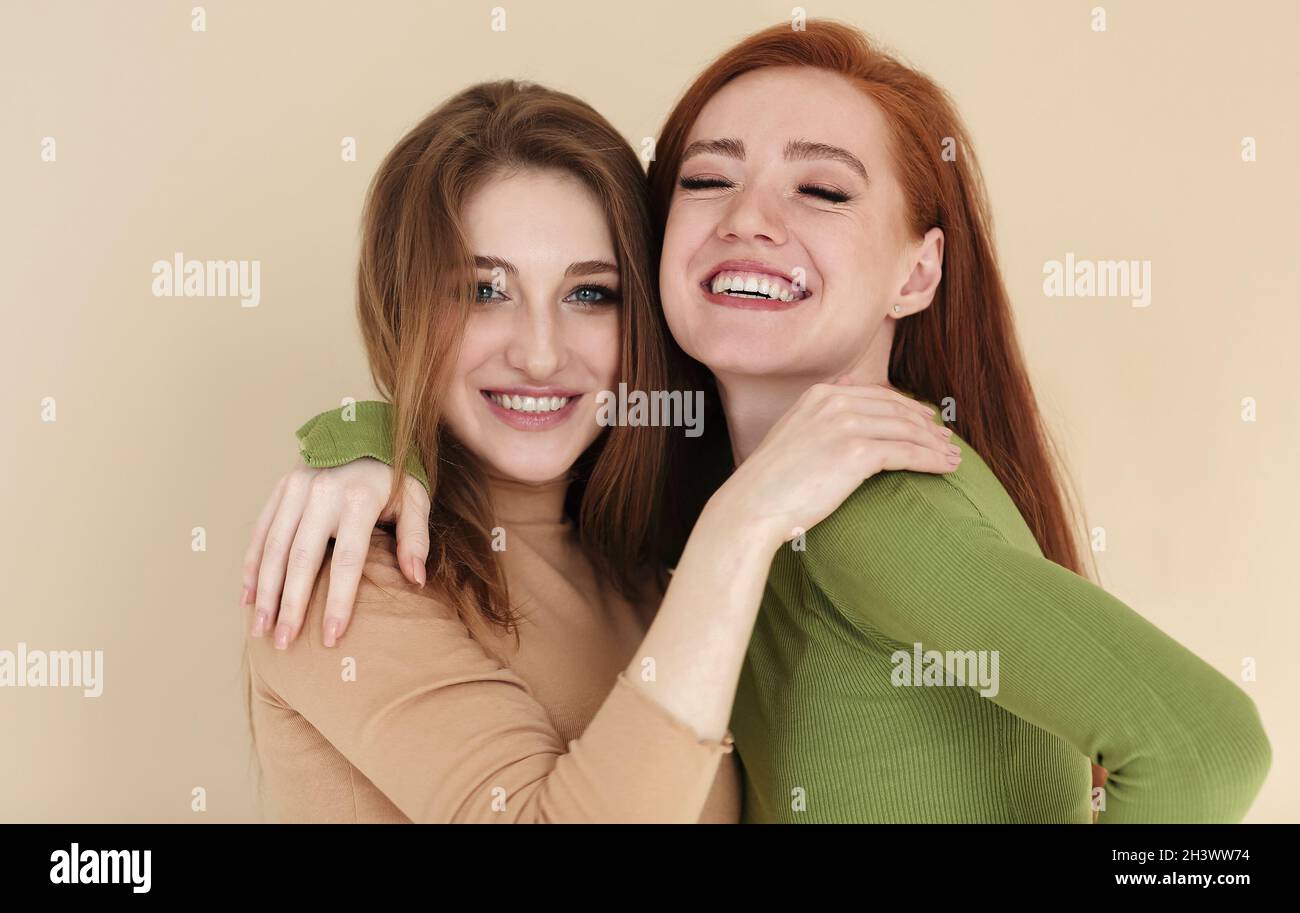 Two cheerful young women Stock Photo - Alamy