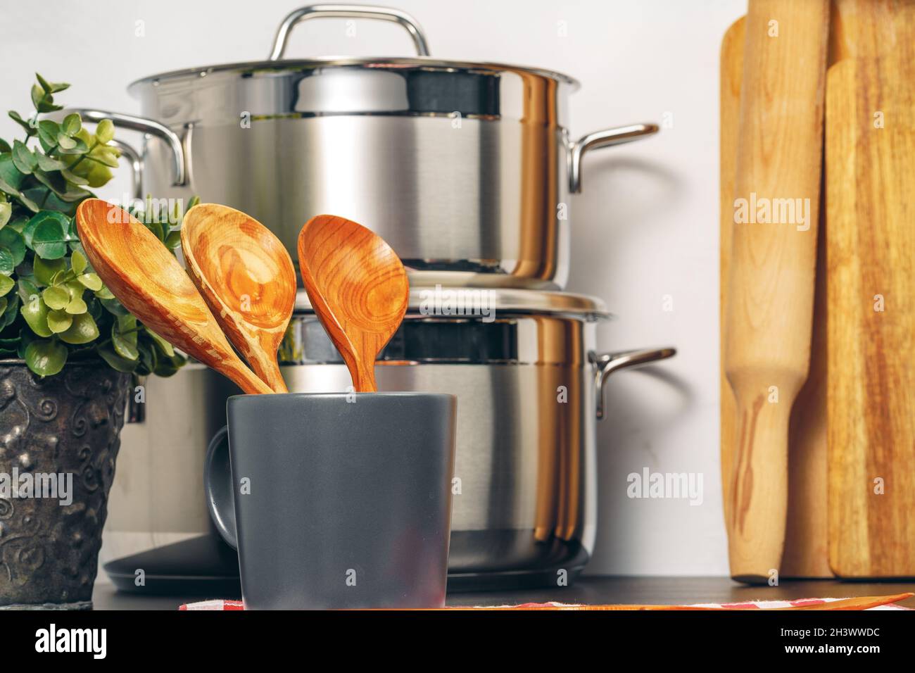Set of cookware utensils on a kitchen counter Stock Photo - Alamy