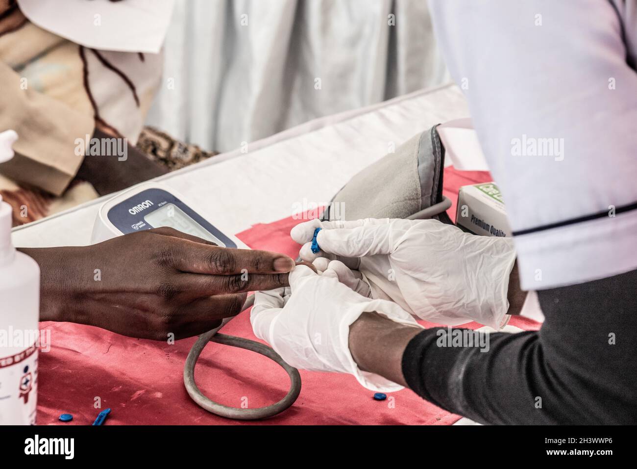 Nairobi, Kenya. 30th Oct, 2021. A nurse taking a blood test of a ...