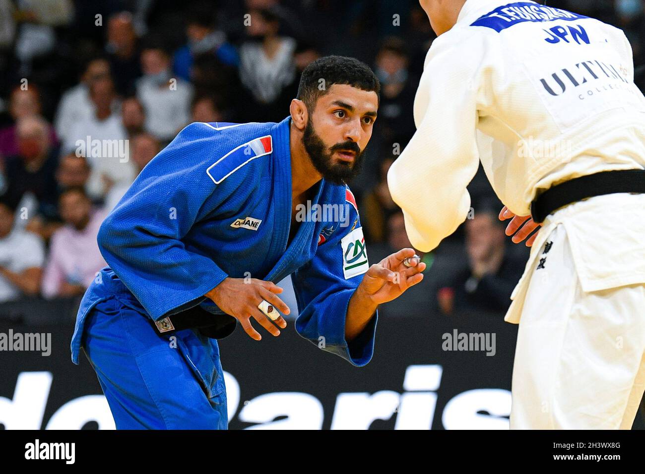 Men -66 kg, Walide KHYAR (blue) of France Bronze medal competes during ...