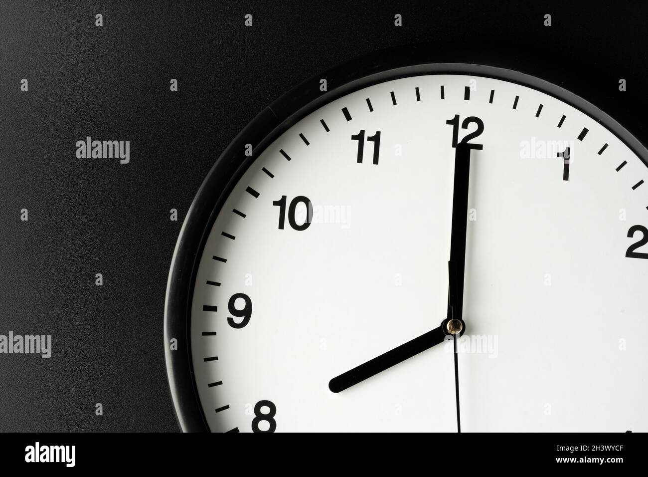 Alarm clock close up on black background Stock Photo - Alamy