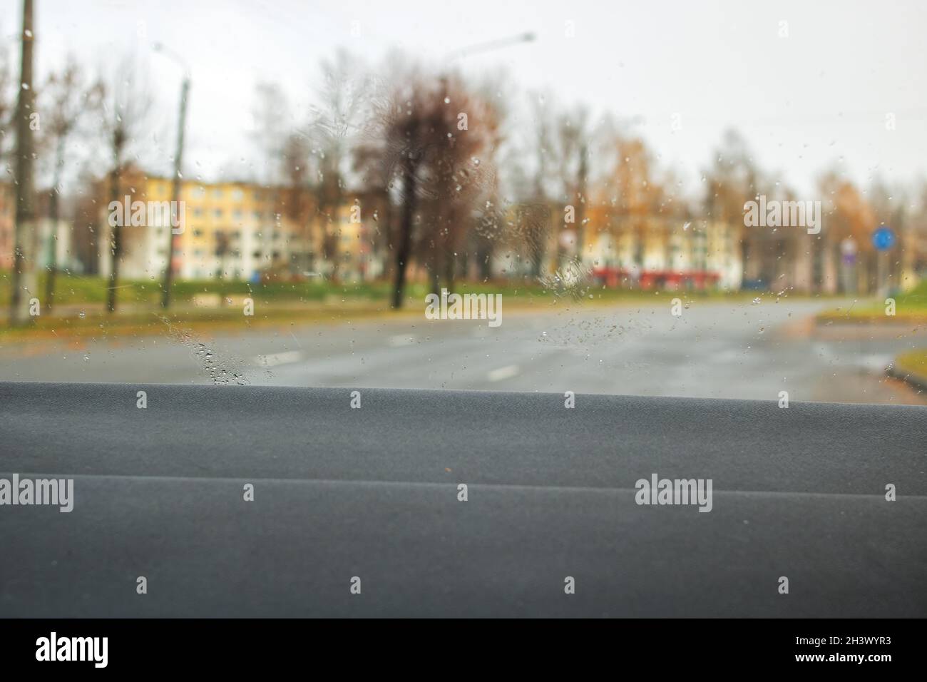 Autumn road behind the windshield of the car close up Stock Photo - Alamy