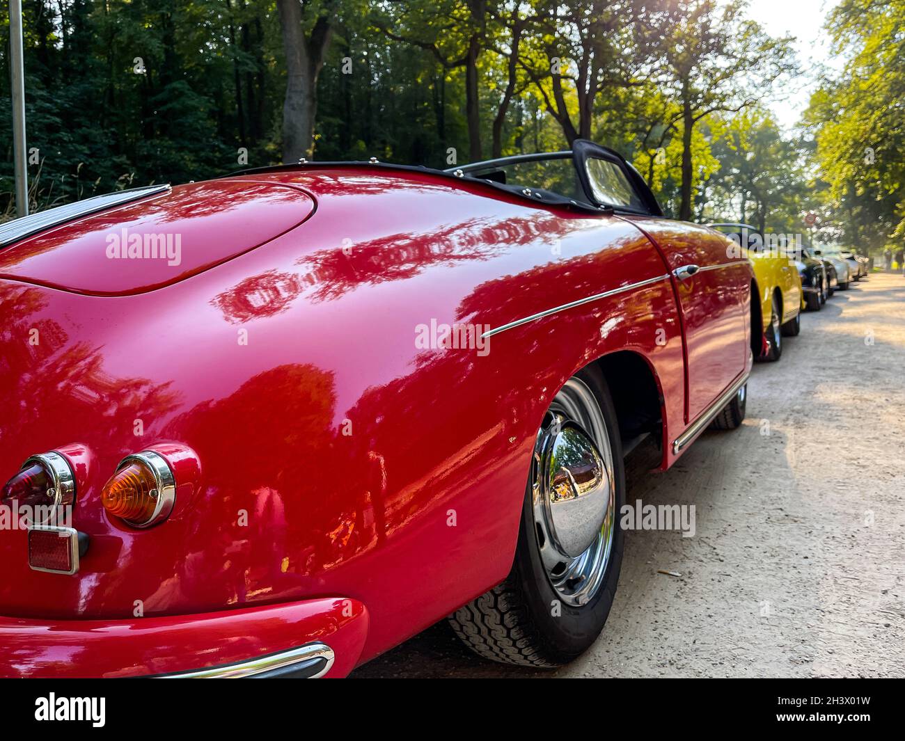Red bonnet of a perfectly restored vintage Porsche Cabrio 356, bak view ...