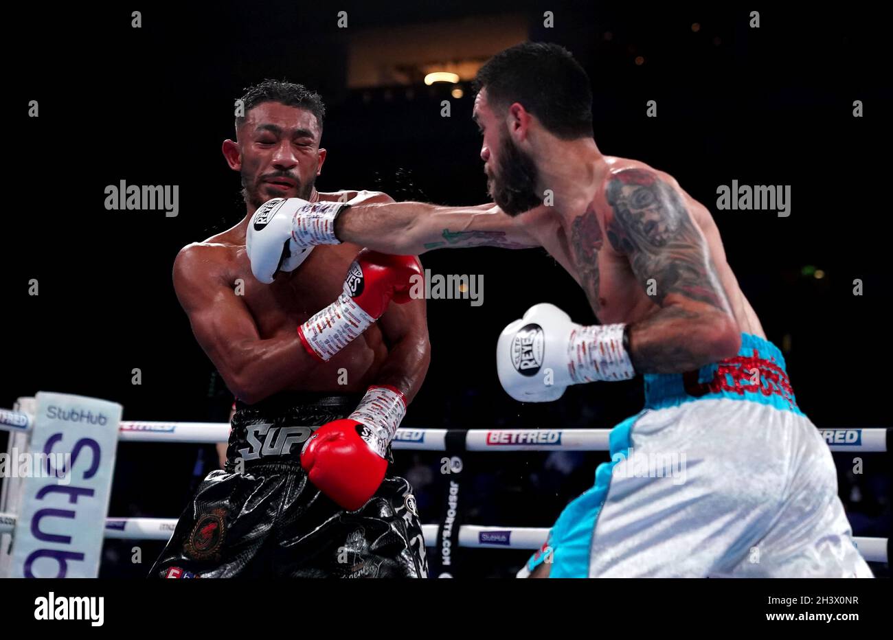 Jorge Castaneda (right) strikes Youssef Khoumari during the vacant WBC International Silver ...