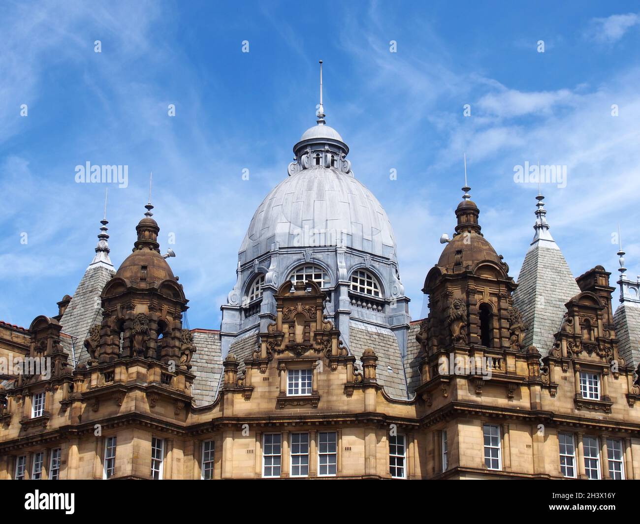 Ornate stone towers and domes on the roof of leeds city market a ...