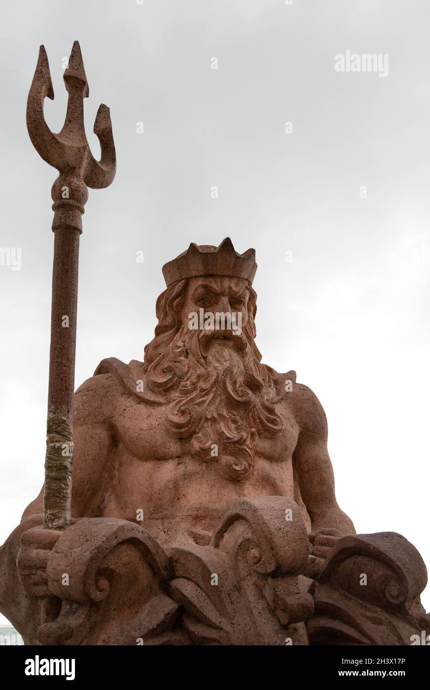 Sculpture of Poseidon, god of water and sea, on the seashore of the ...