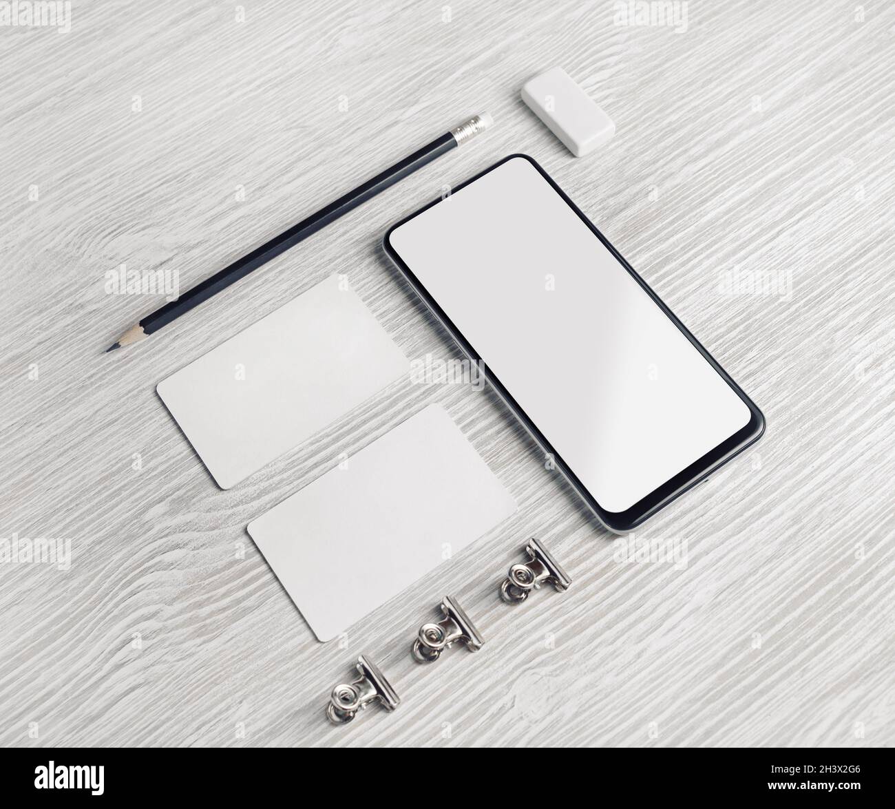 Smartphone, business cards, pencil, eraser Stock Photo - Alamy