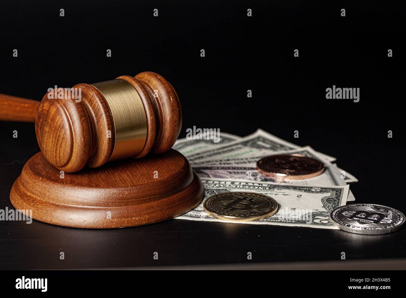 Law mallet and a stack of money Stock Photo - Alamy