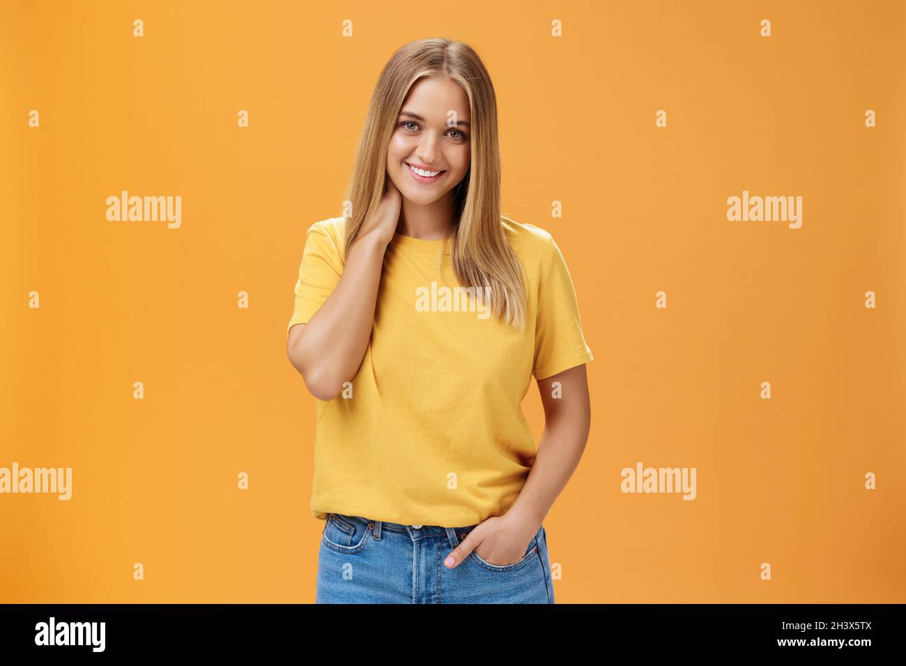 Portrait of shy and timid feminine girl with tan and straight fait hair ...