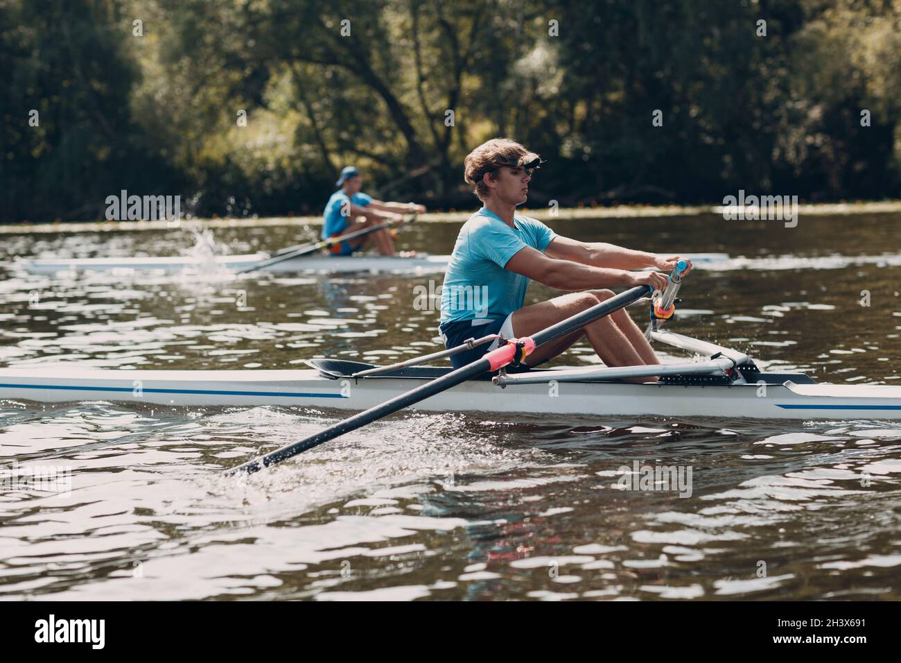 Sportsman single scull man rower prepare to competition boat regatta ...
