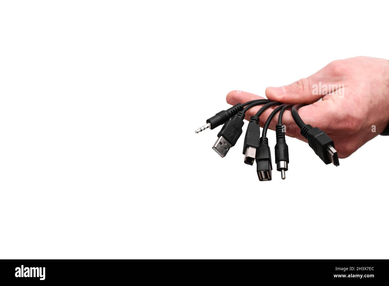 A bunch of different wires of computer connectors in the hand. mock up ...