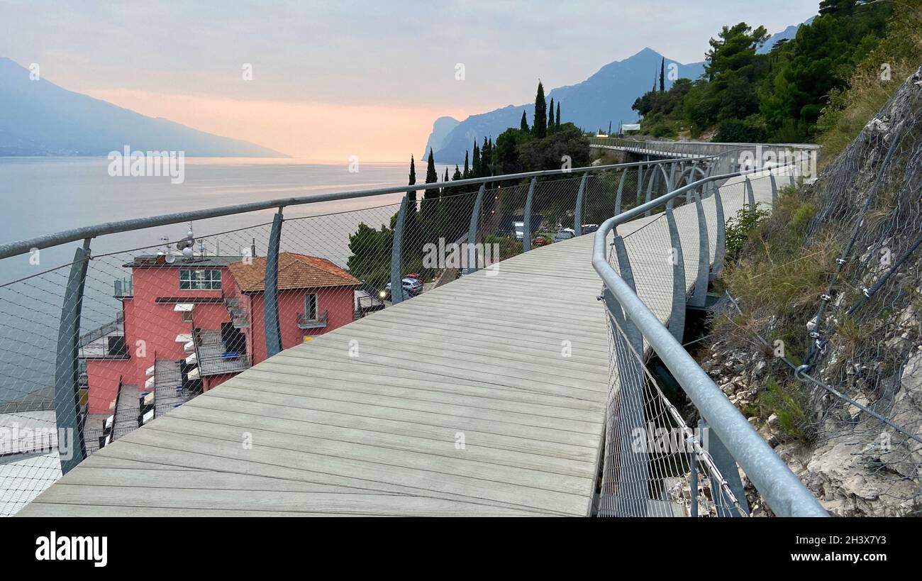 Cycle path in Limone sul Garda at the western bank of Lake Garda ...
