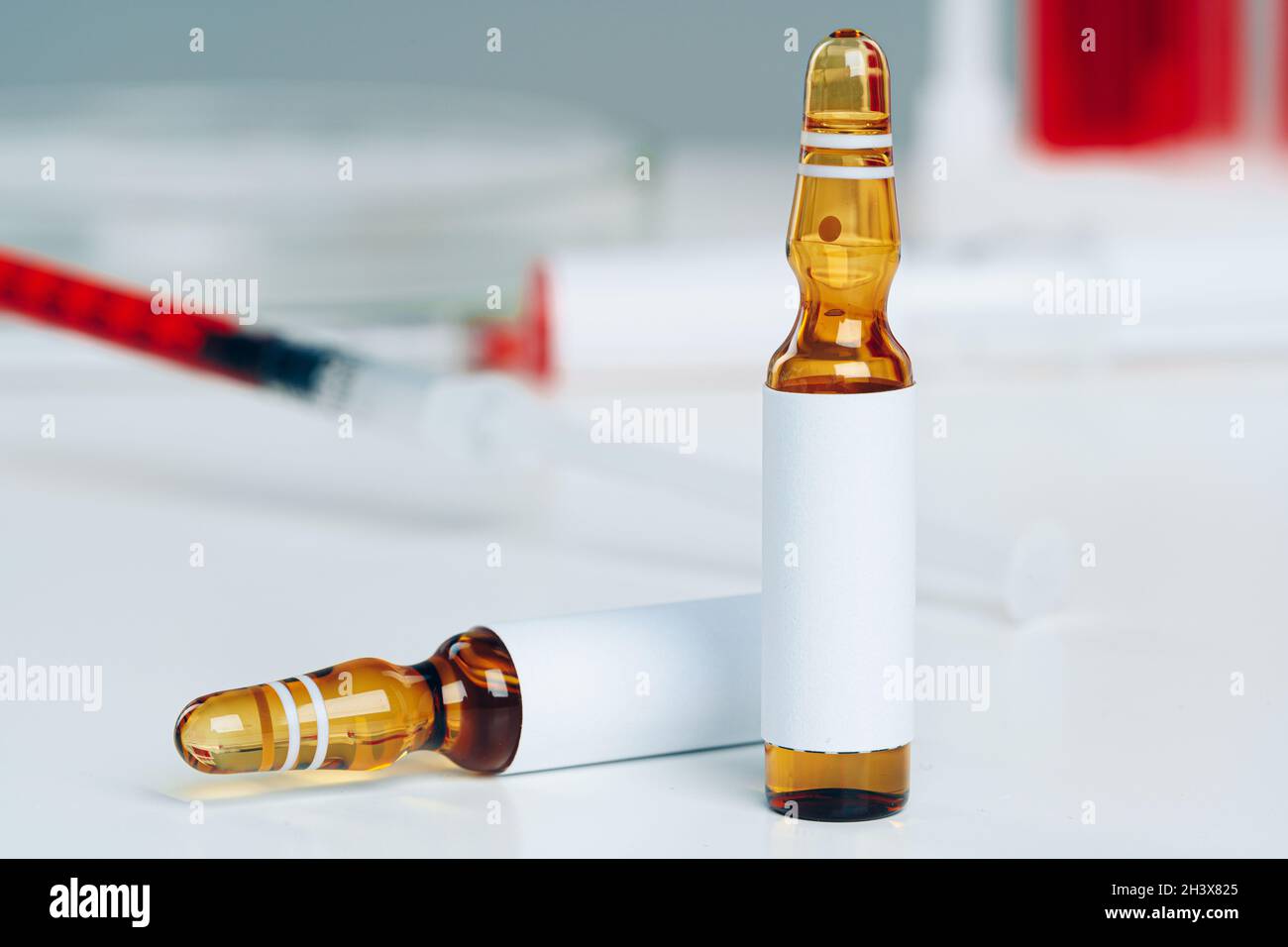 Glass medical ampoule bottles vial for injection Stock Photo - Alamy