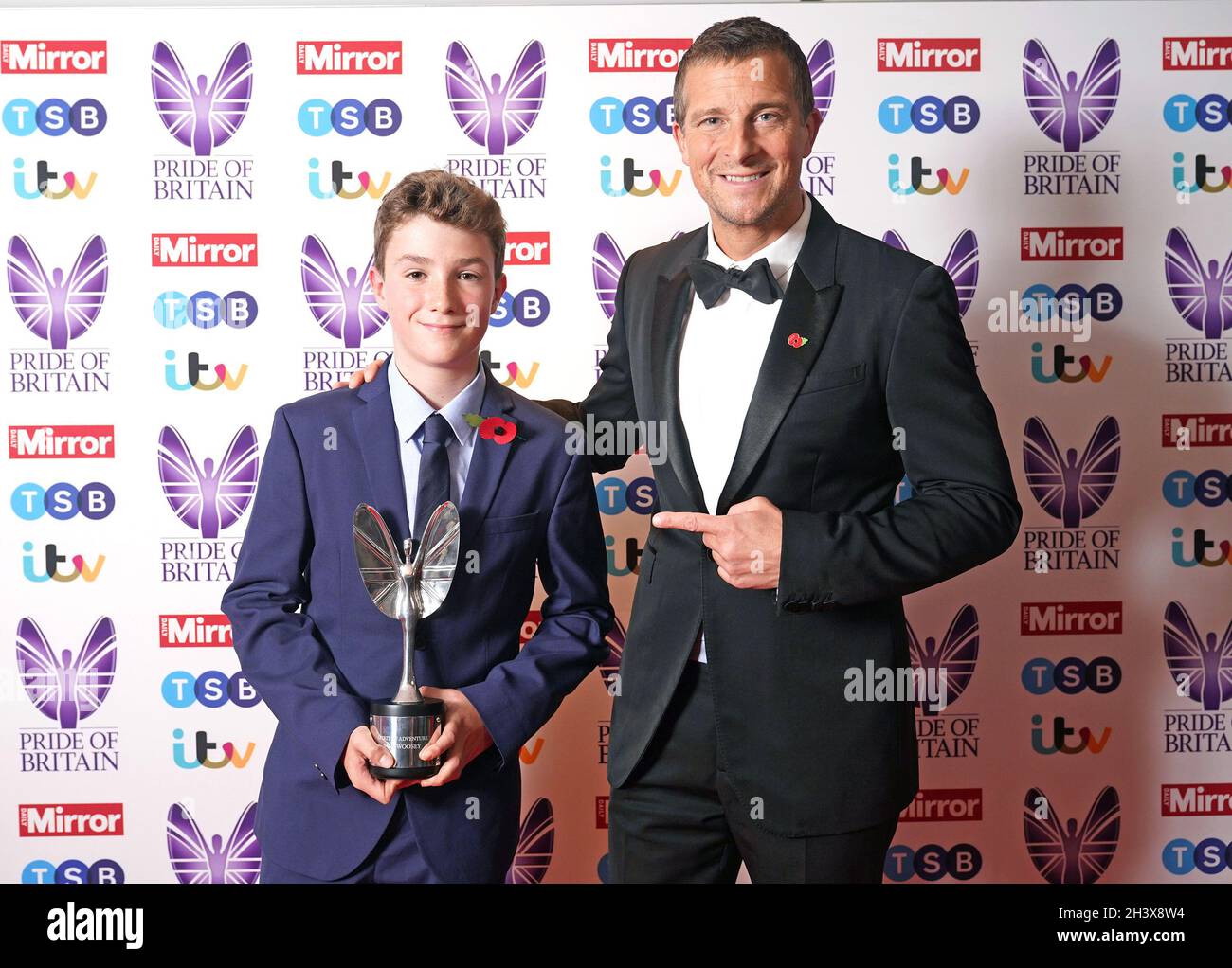 Spirit of Adventure Award winner Max Woosley with presenter Bear Grylls ...