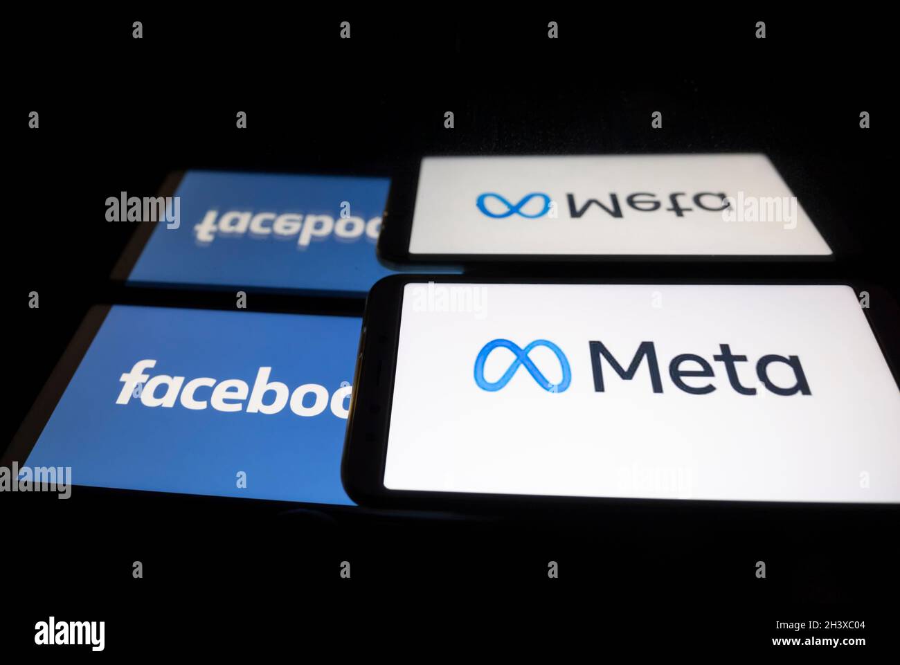 In this photo illustration, Meta and Facebook logos seen displayed on a ...