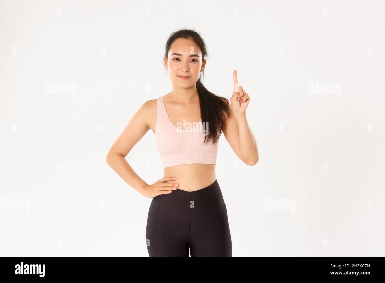 Sport, wellbeing and active lifestyle concept. Smiling asian fitness ...