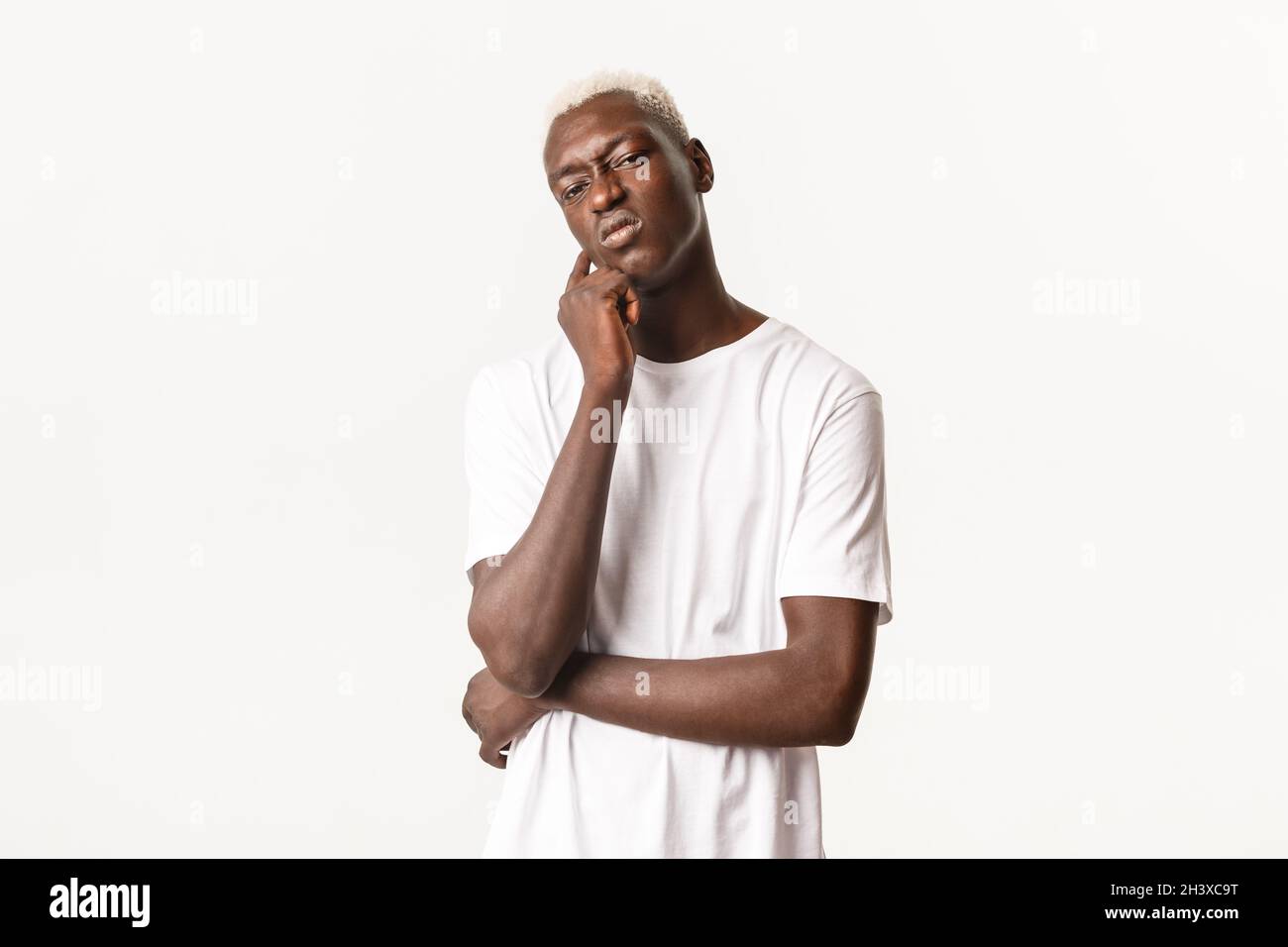 Portrait of disappointed, angry african-american blond man looking with ...