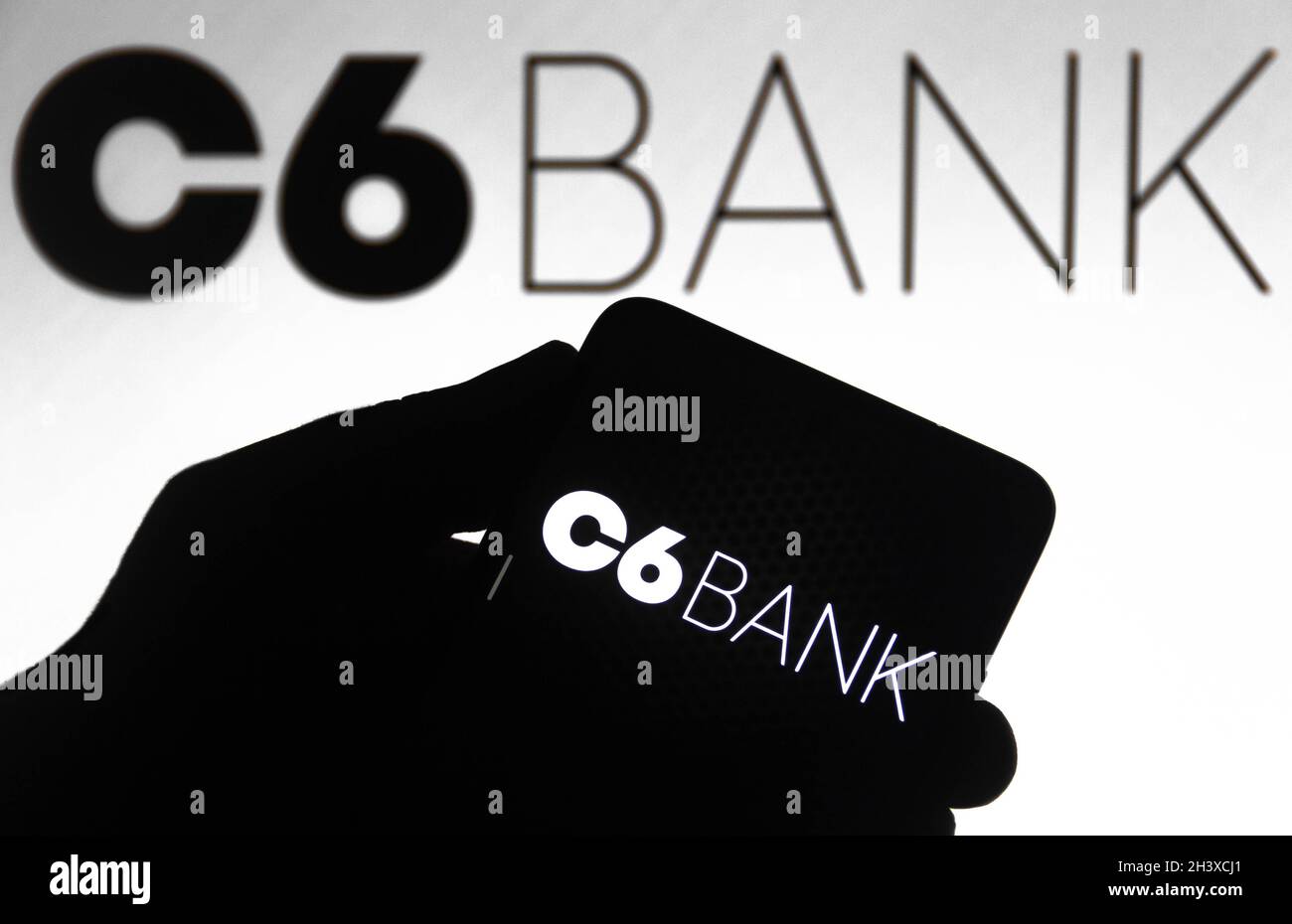 In this photo illustration the C6 Bank logo seen displayed on a ...